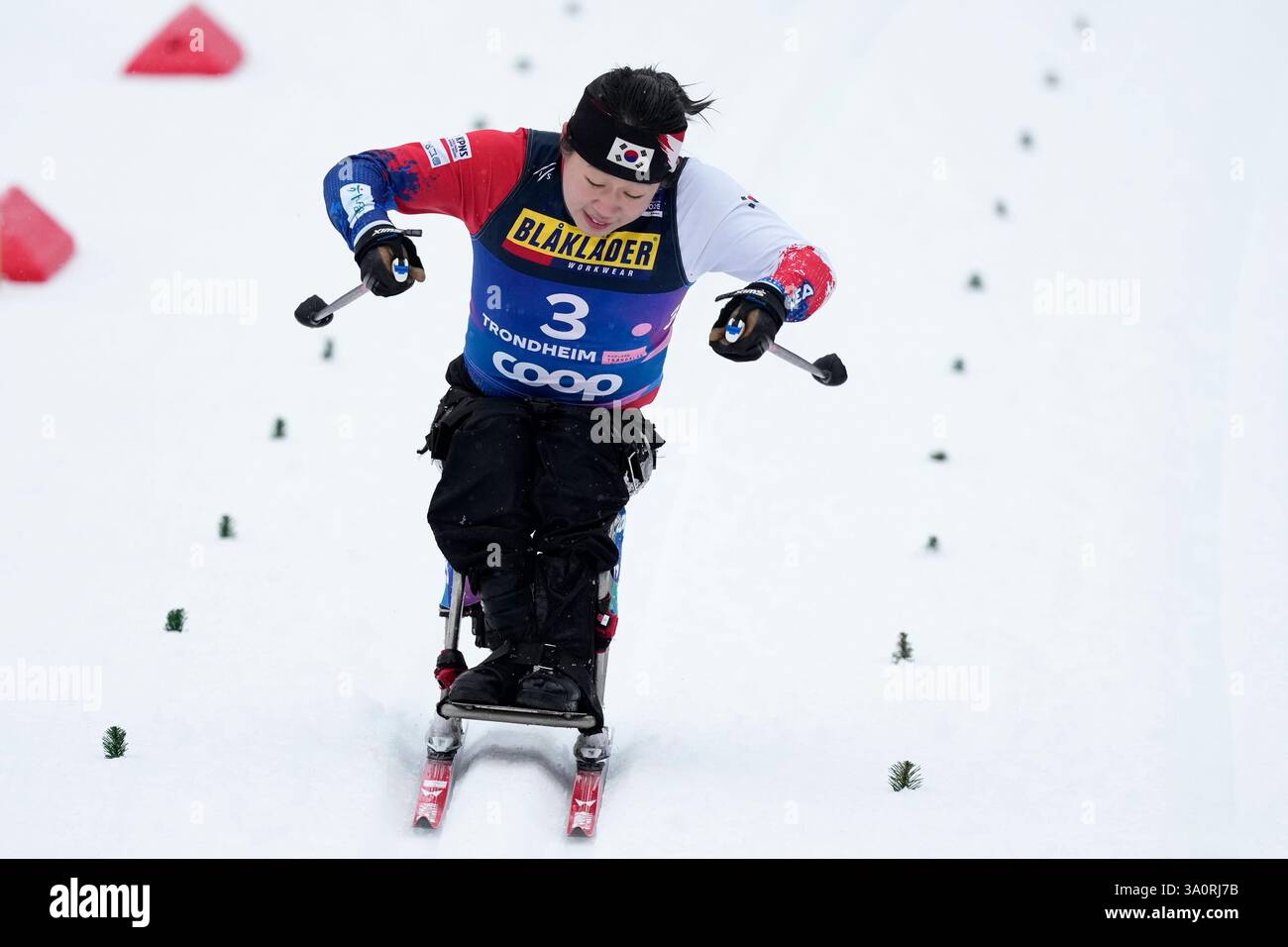 Kim Yunji, of South Korea, competes in the para cross-country women's ...