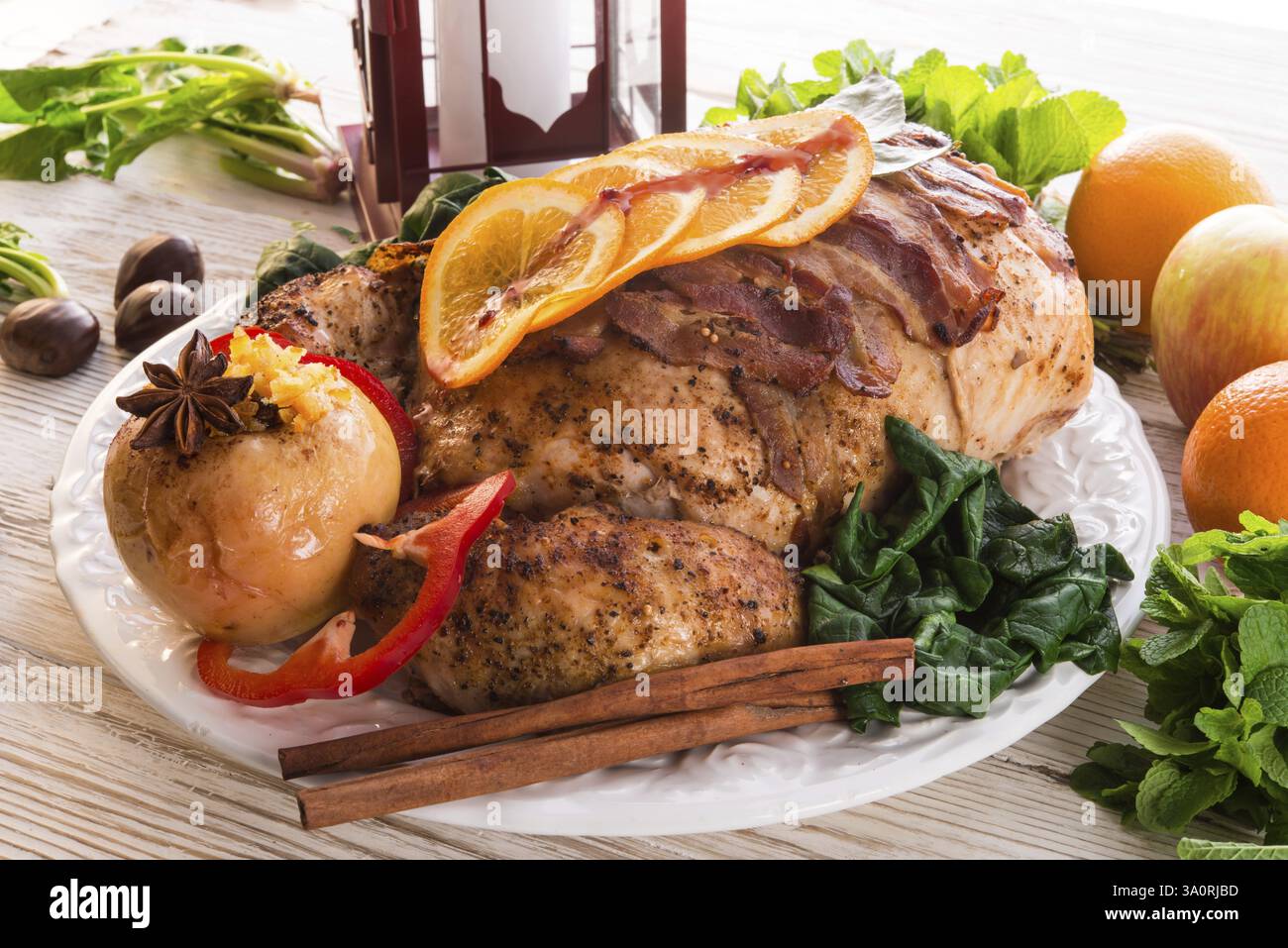 Baked turkey with chestnut filling and orange Stock Photo - Alamy