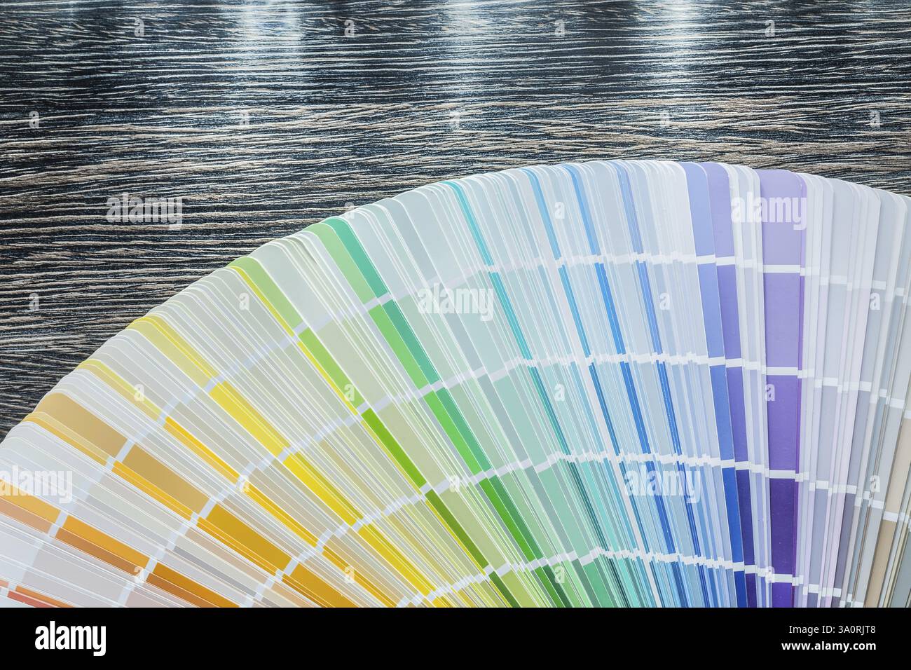 Colour palette fan on wooden board Stock Photo - Alamy