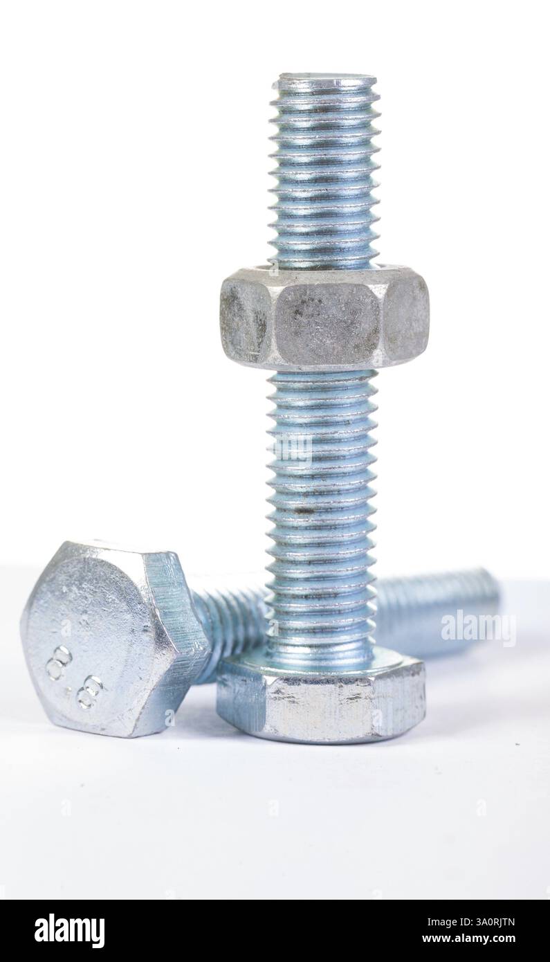 Bolts with nut on white Stock Photo - Alamy