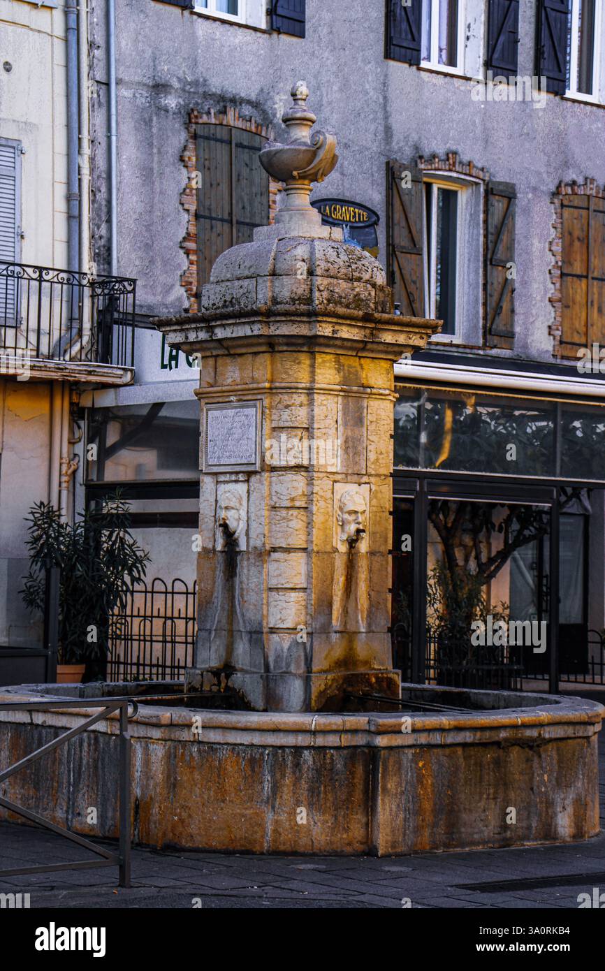 Historic fountain in a old French provencal town square Stock Photo - Alamy