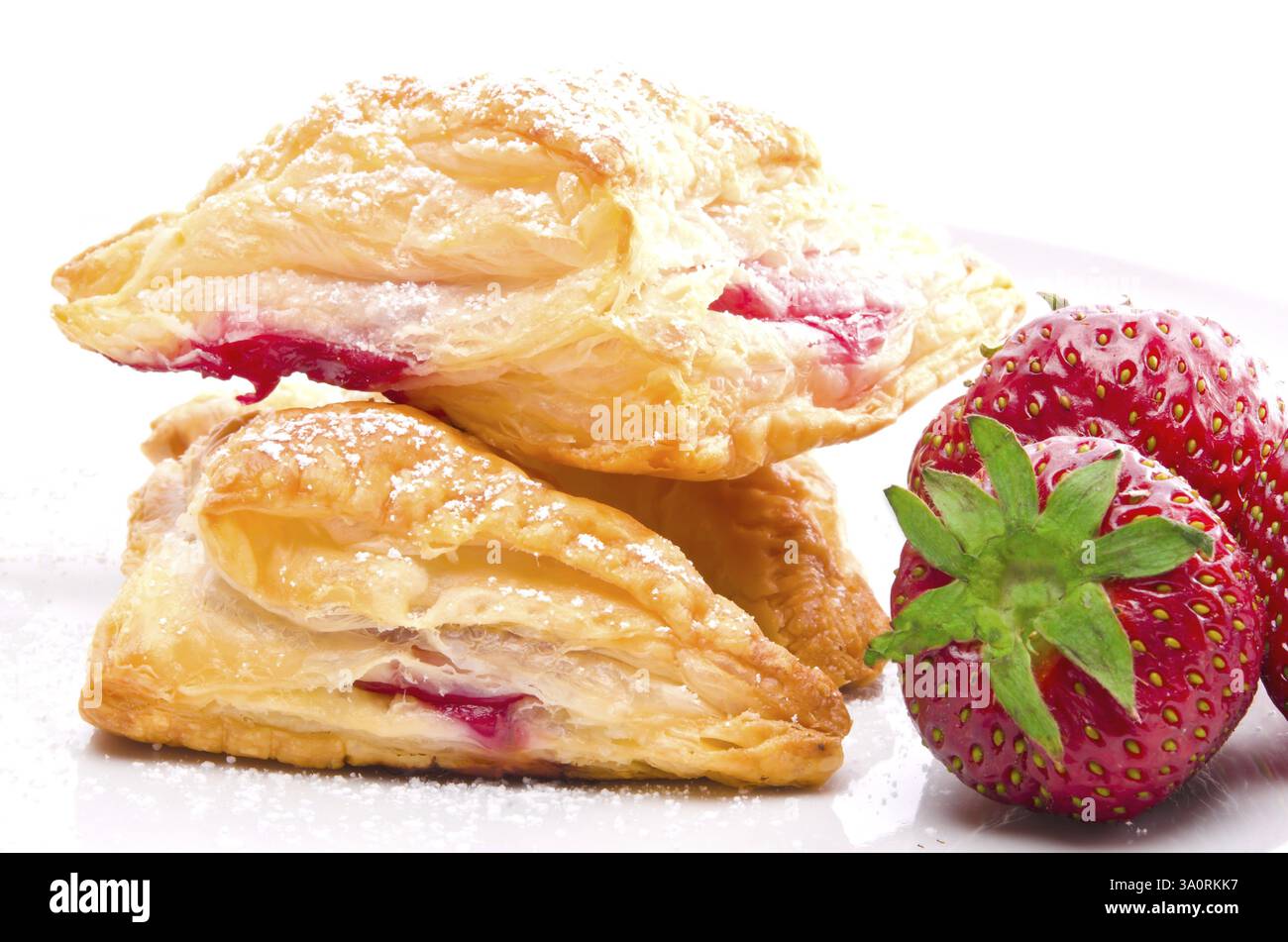 Puff pastry pockets with strawberry filling Stock Photo - Alamy