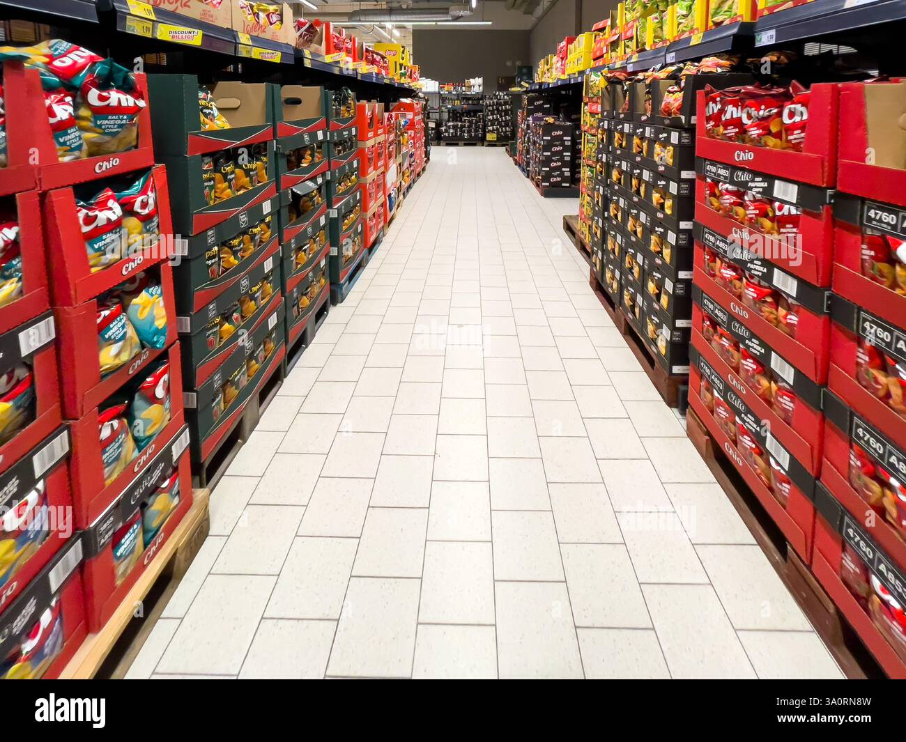 Germany Berlin February 19, 2025 A large aisle of snacks in a store ...