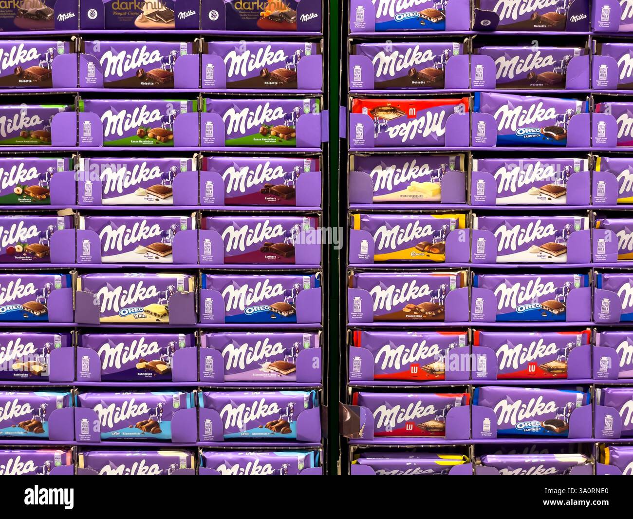 Germany Berlin February 19, 2025 A row of Milka chocolate bars are ...