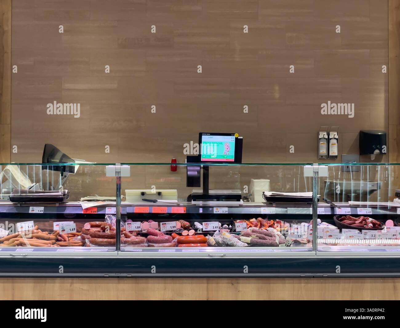 Germany Berlin March 3, 2025 A meat counter with a digital display ...