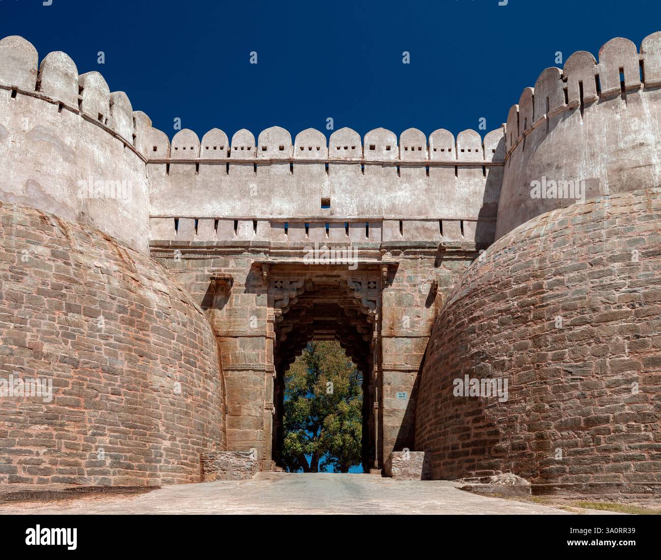 Ram Pol (Ram Gate) in the walls and battlements of Kumbhalgarh Fort in ...