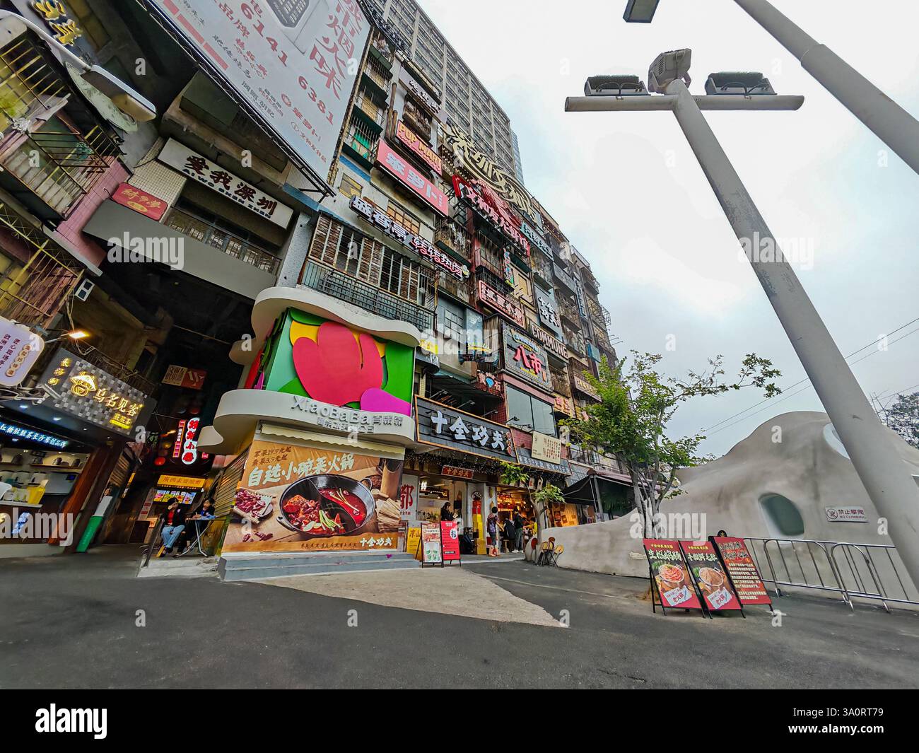 ShenZhen, China - March 05, 2025 : Busy Dong Men Pedestrian Street is a ...