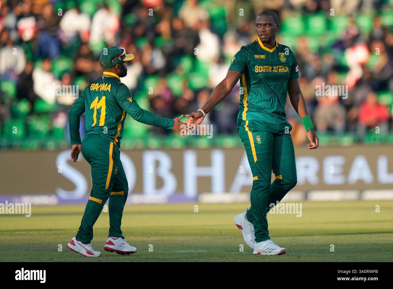 South Africa's Lungi Ngidi, right, celebrates with captain Temba Bavuma ...