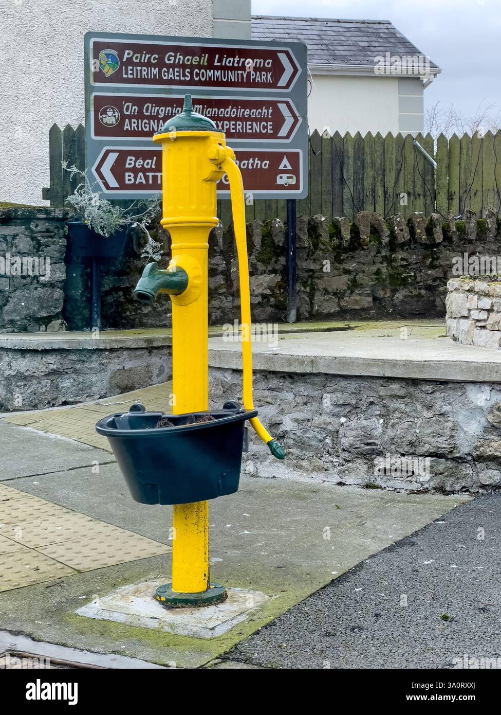 Leitrim , Irelend - 01 March, 2025, Vintage water-pump in old village ...