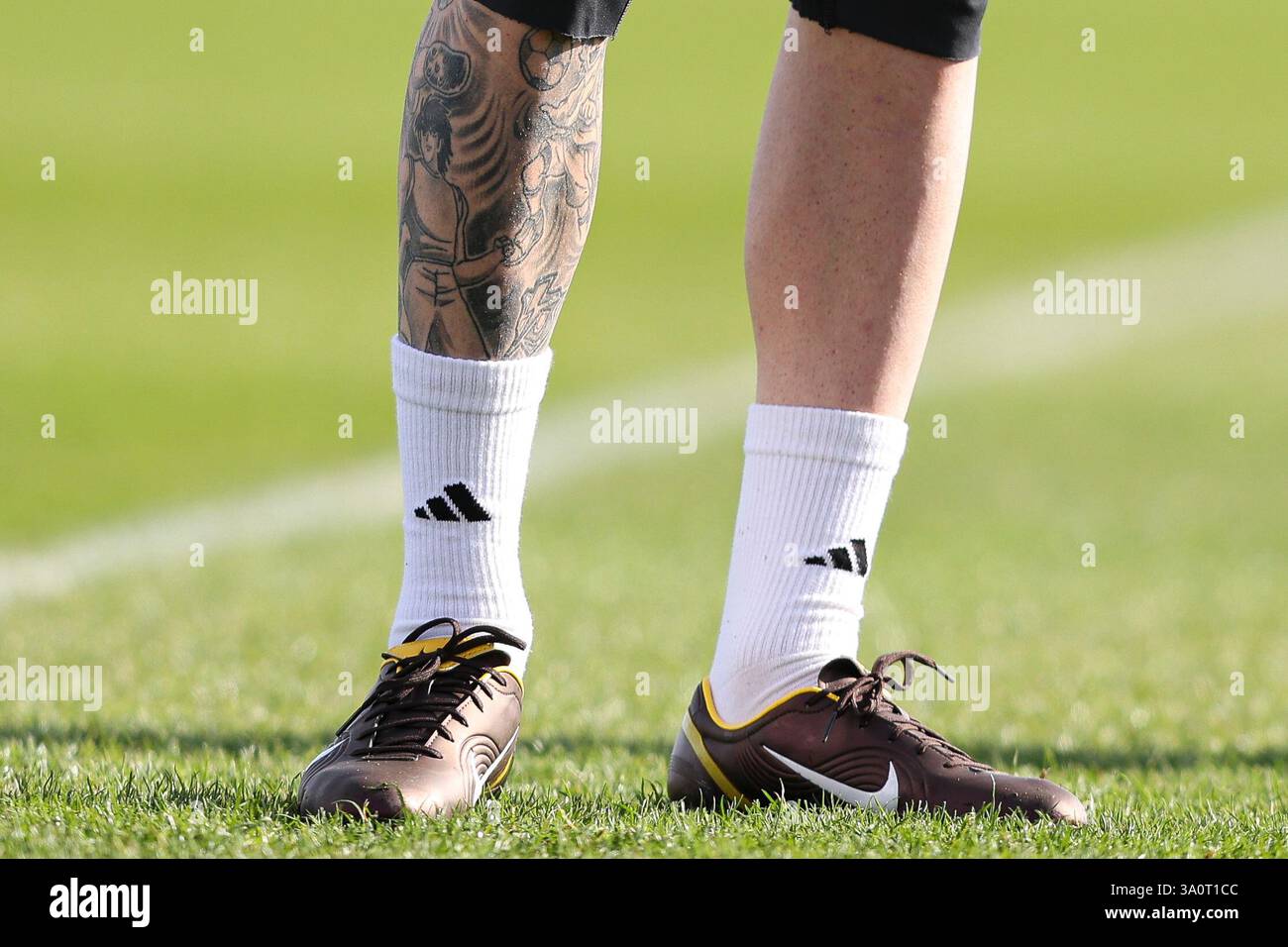 Manchester, UK. 05th Mar, 2025. Tattoo detail on the leg of Alejandro ...