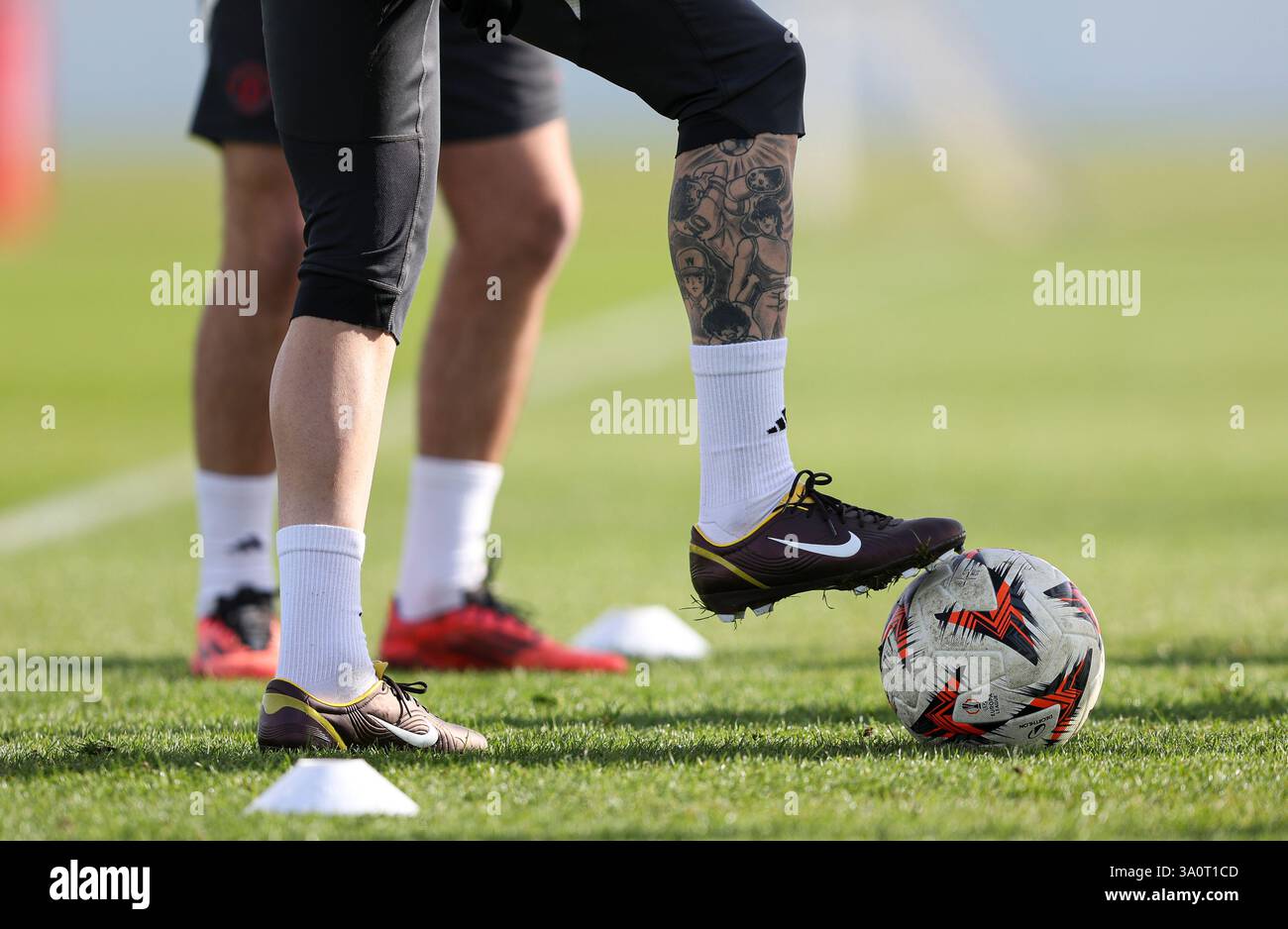 Manchester, UK. 05th Mar, 2025. Tattoo detail on the leg of Alejandro ...