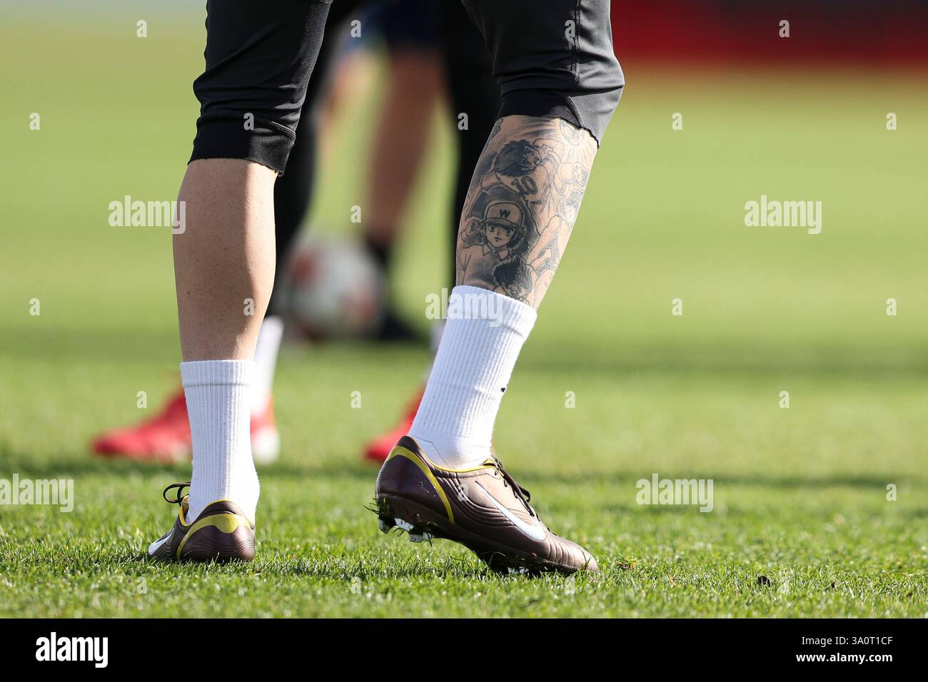 Manchester, UK. 05th Mar, 2025. Tattoo detail on the leg of Alejandro ...