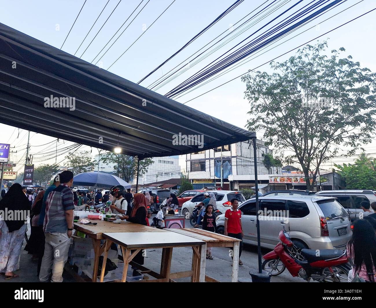 Duri, Riau, Indonesia - March 1, 2025: The crowd when people buying ...