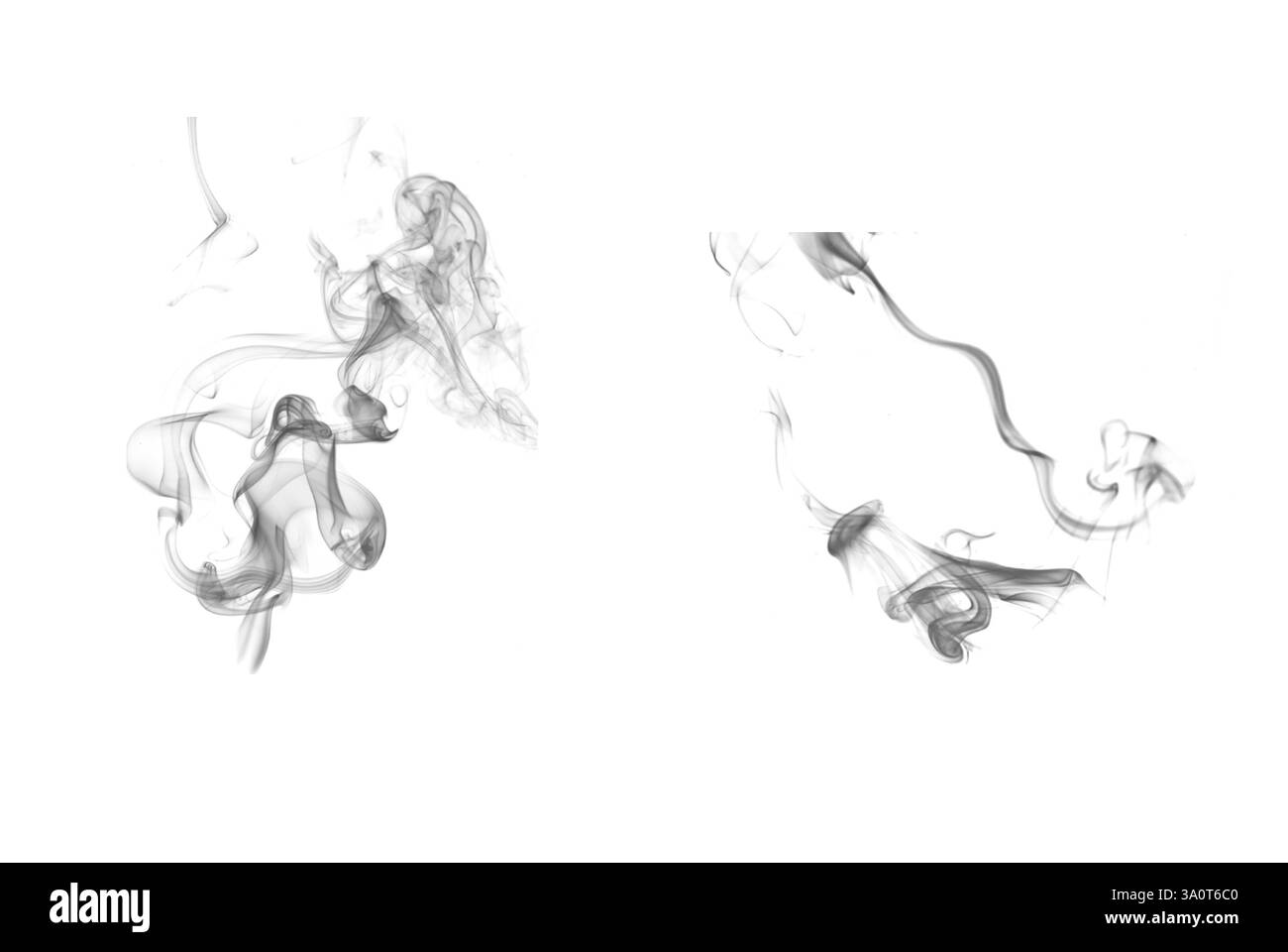 In the photo, various forms of smoke are shown rising upwards and ...