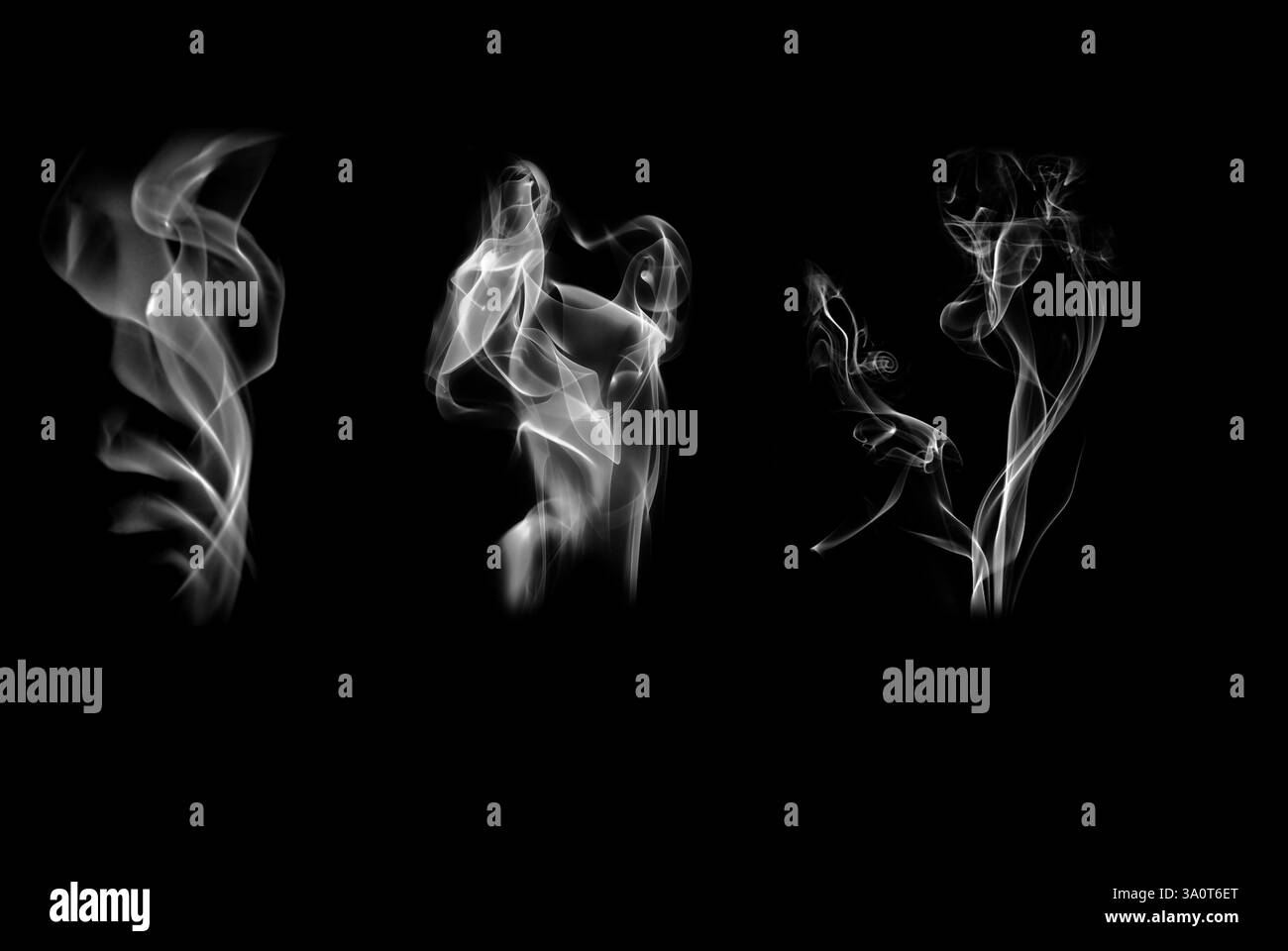 In the photo, various forms of smoke are shown rising upwards and ...