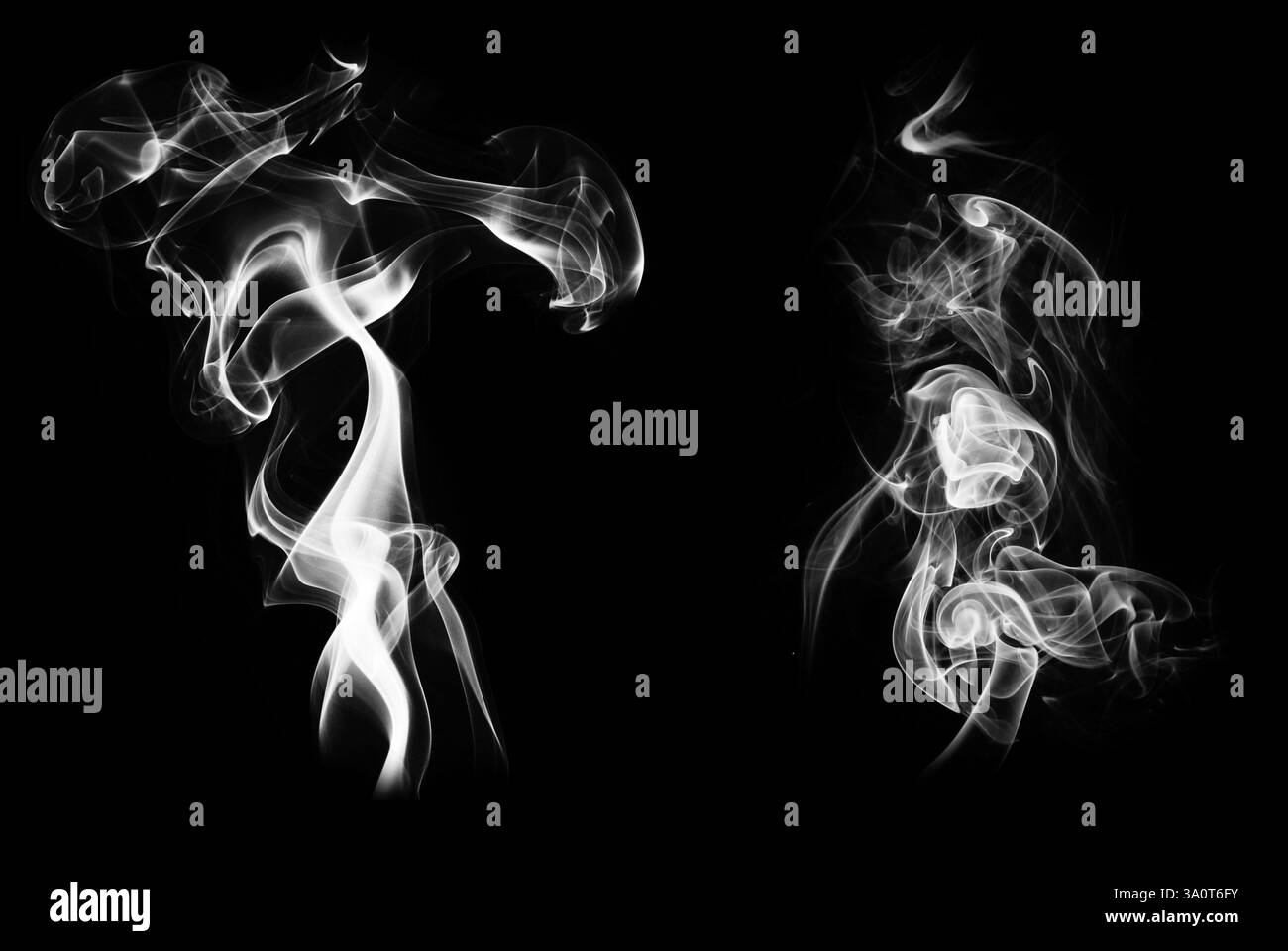 In the photo, various forms of smoke are shown rising upwards and ...