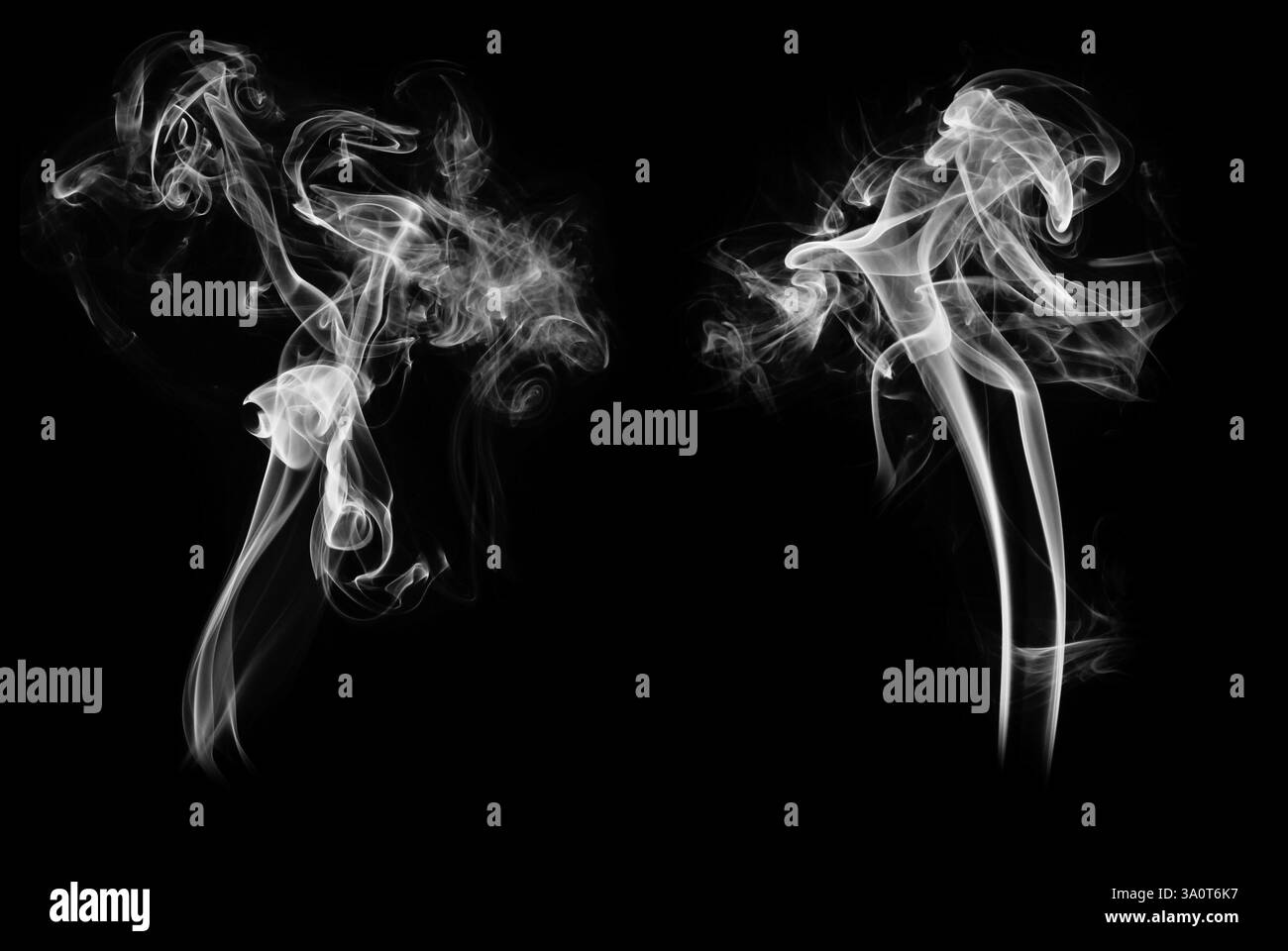 In the photo, various forms of smoke are shown rising upwards and ...