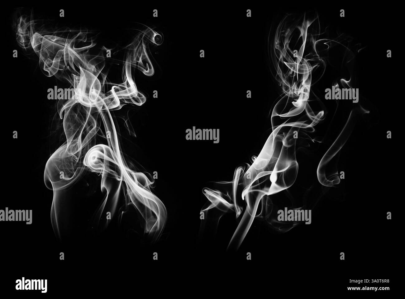 In the photo, various forms of smoke are shown rising upwards and ...