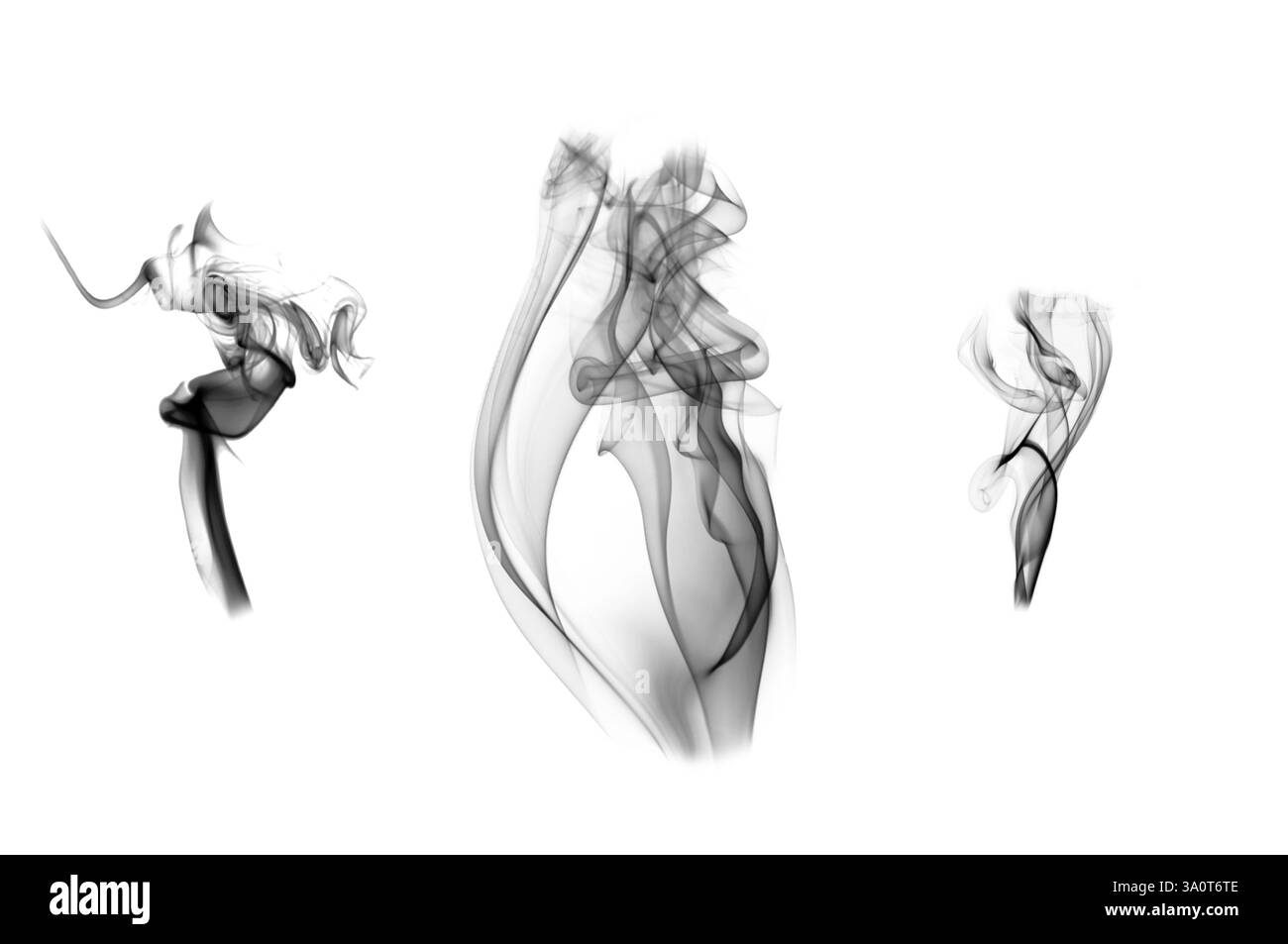 In the photo, various forms of smoke are shown rising upwards and ...