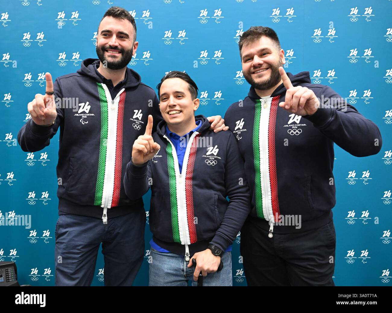 Milan. 5th Mar, 2025. Paralympic ice hockey players Andrea Macri (L ...