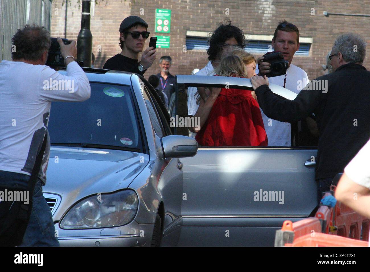 Kate Moss arrives with daughter Lila at a Babyshambles gig in London ...