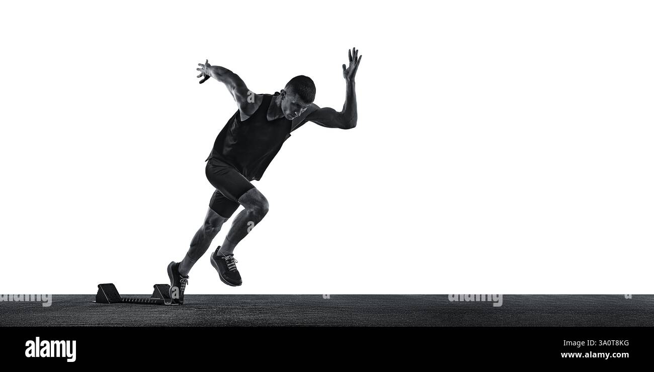 Dynamic photo of young athletic man, sprinter running from start line ...