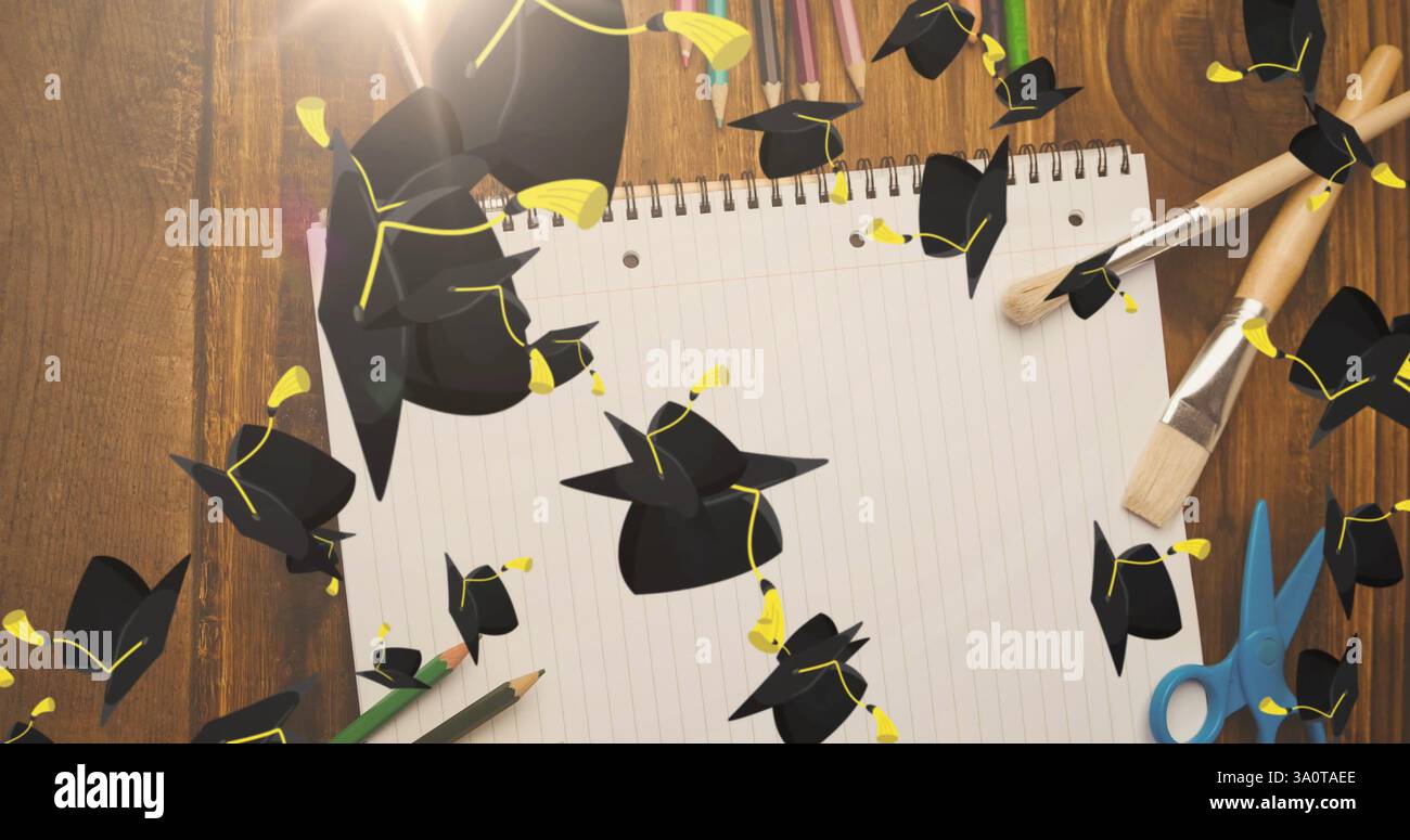 Graduation caps image over open notebook with pencils and paintbrushes ...