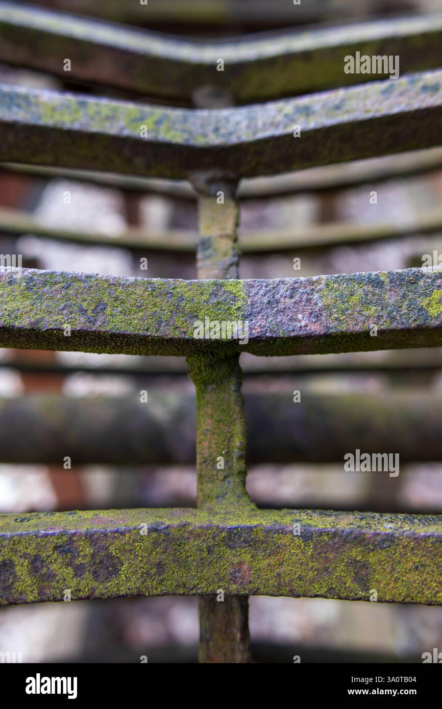 Close-up of rusted metal grates, showcasing their aged texture and ...