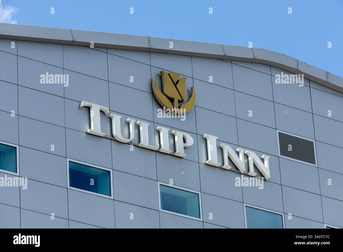 Tulip Inn logo sign. Tulip Inn Hotel at Eindhoven airport Stock Photo ...