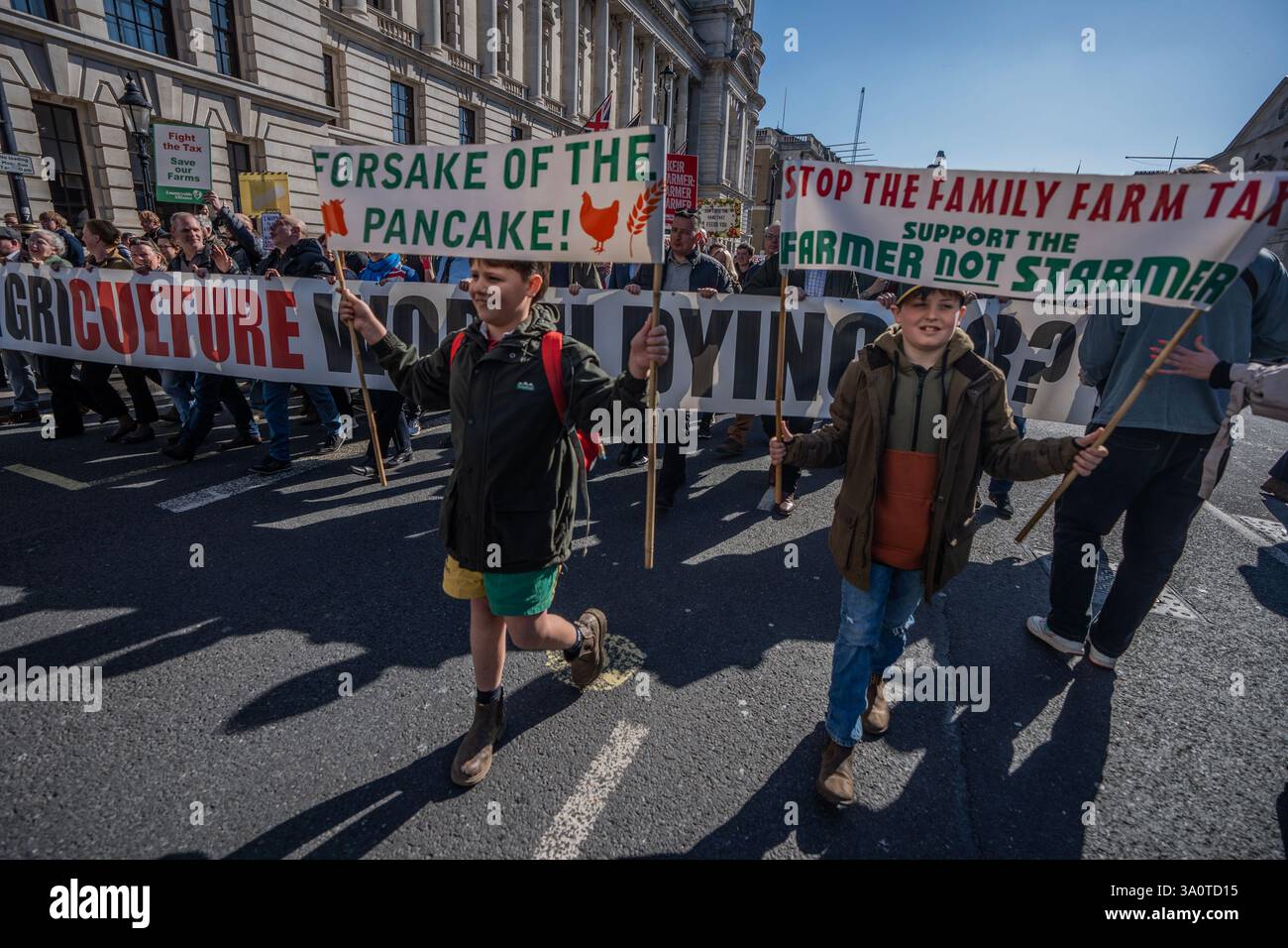 London, UK. 04th Mar, 2025. Protesters march with banners during the ...