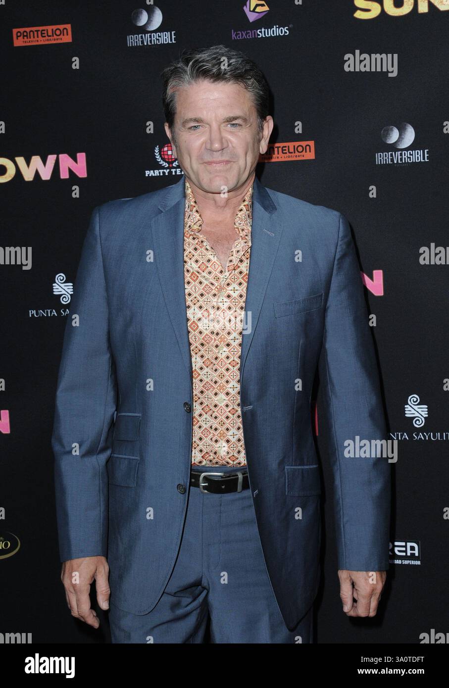 John Michael Higgins arriving at the premiere of 'Sundown' at the ...
