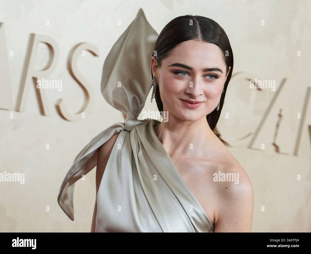 Raffey Cassidy walking on the red carpet at the The 97th Academy Awards ...