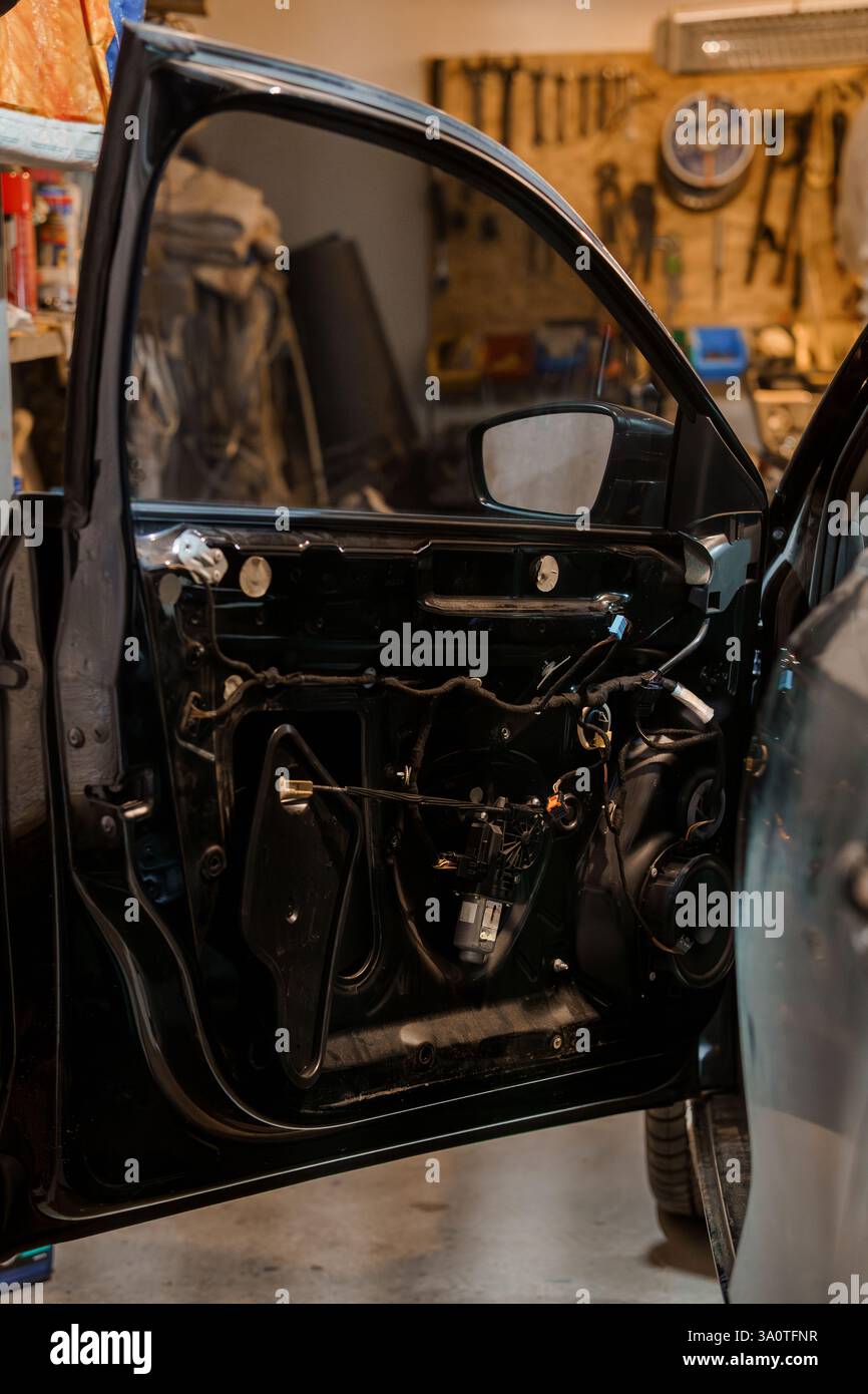 Close-up View of Car Door Interior with Exposed Parts and Workshop ...