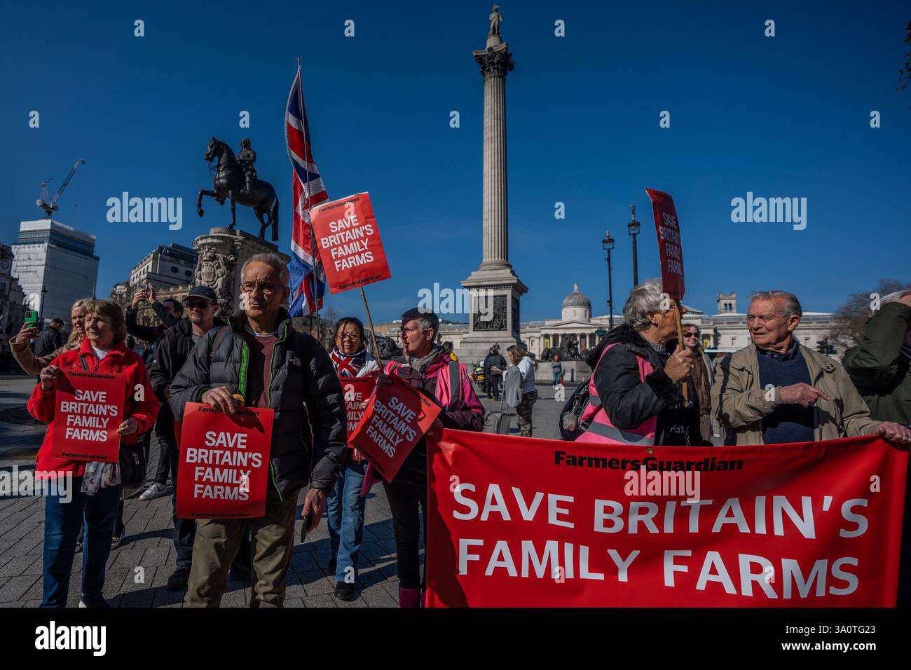 Protesters hold placards and a banner saying "Save Britain's Family ...