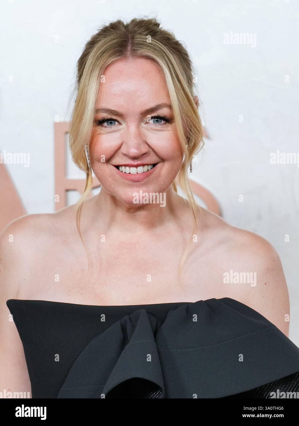 Lynette Howell walking on the red carpet at the The 97th Academy Awards ...