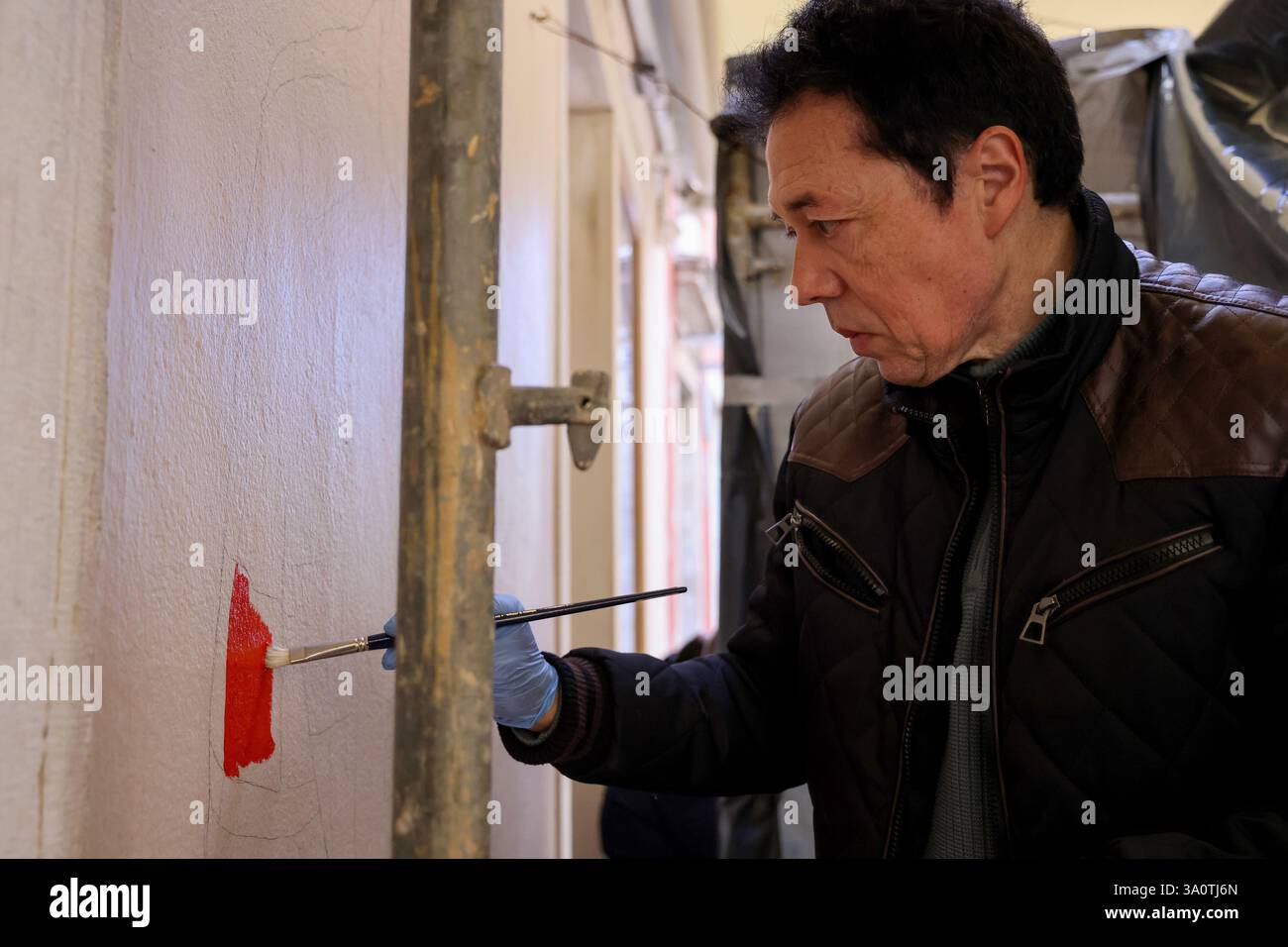 Croatian artist Valentino Radman creates an Luka Modric mural in Zadar ...