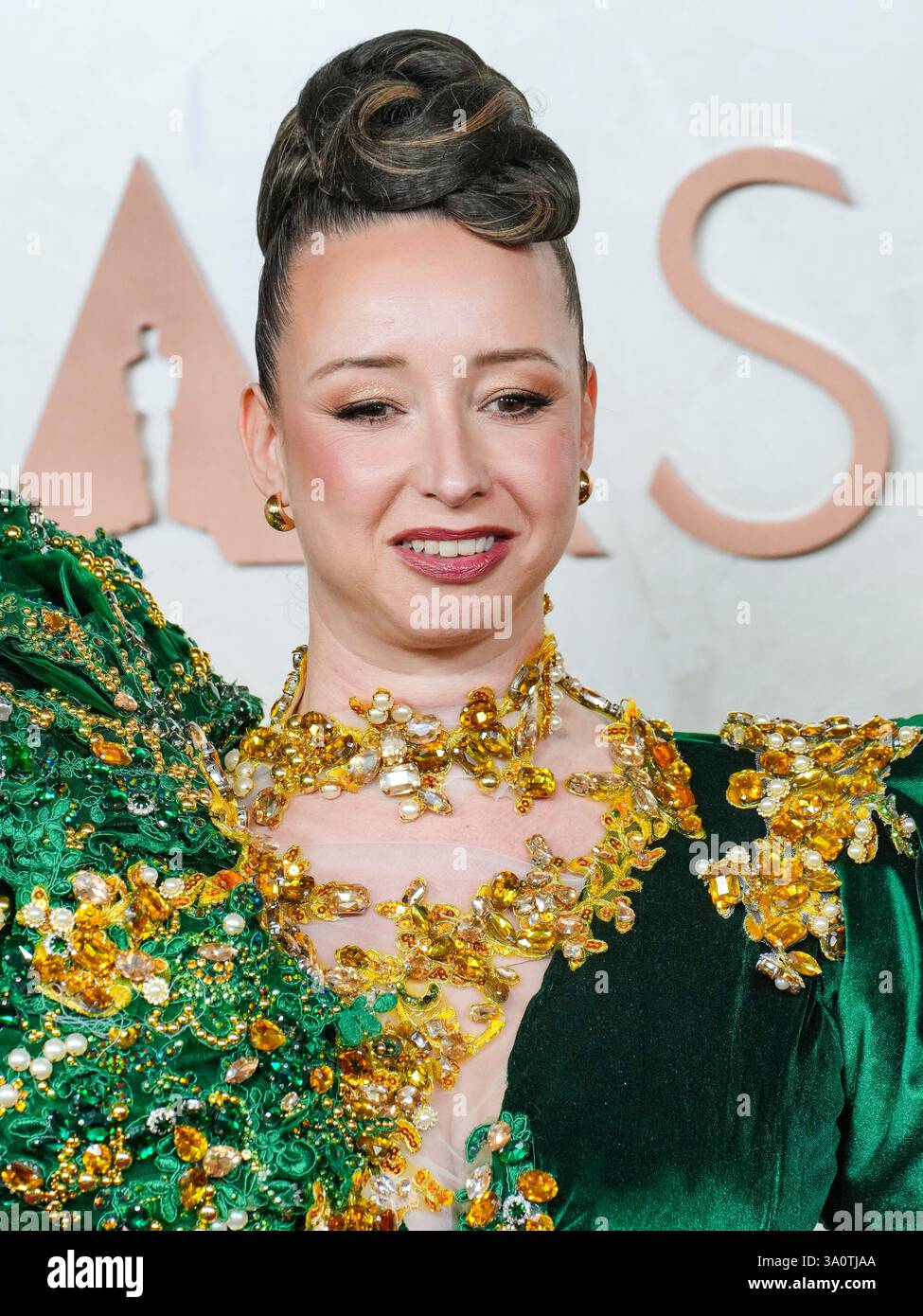 Laura Blount walking on the red carpet at the The 97th Academy Awards ...