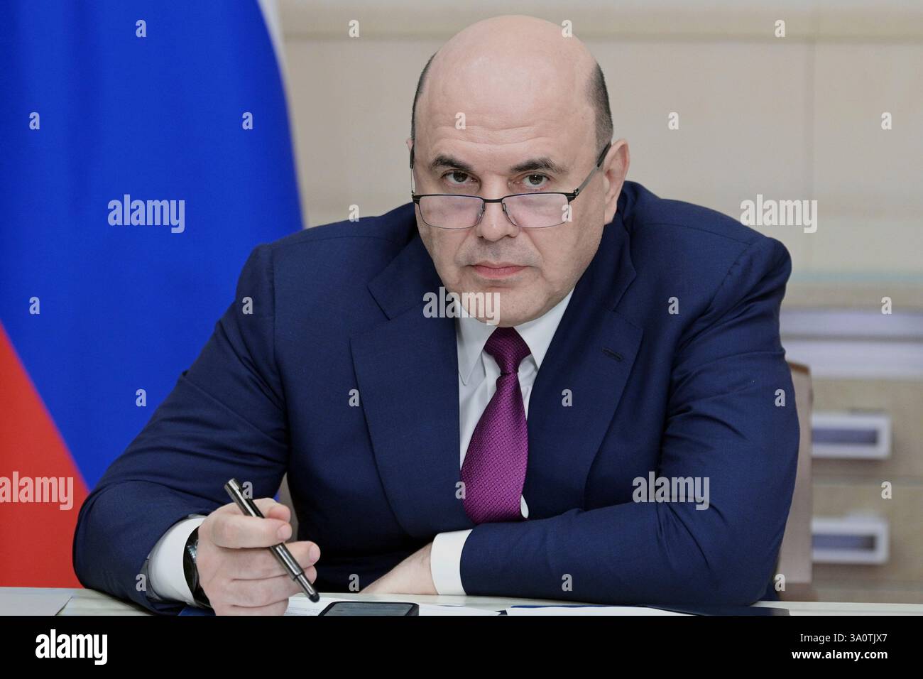Russian Prime Minister Mikhail Mishustin attends a cabinet meeting with ...
