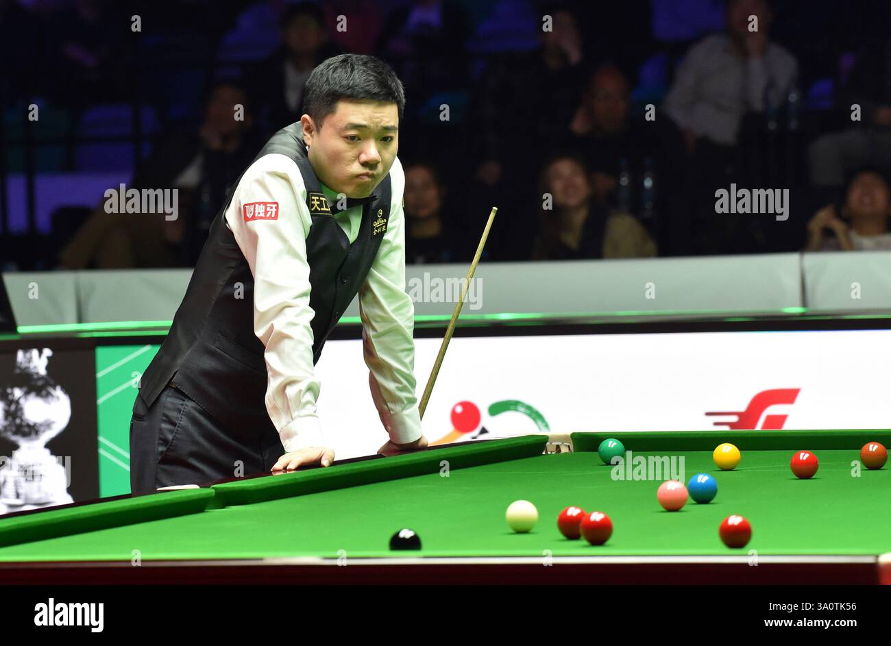 Hong Kong, China. 5th Mar, 2025. Ding Junhui of China reacts during the ...