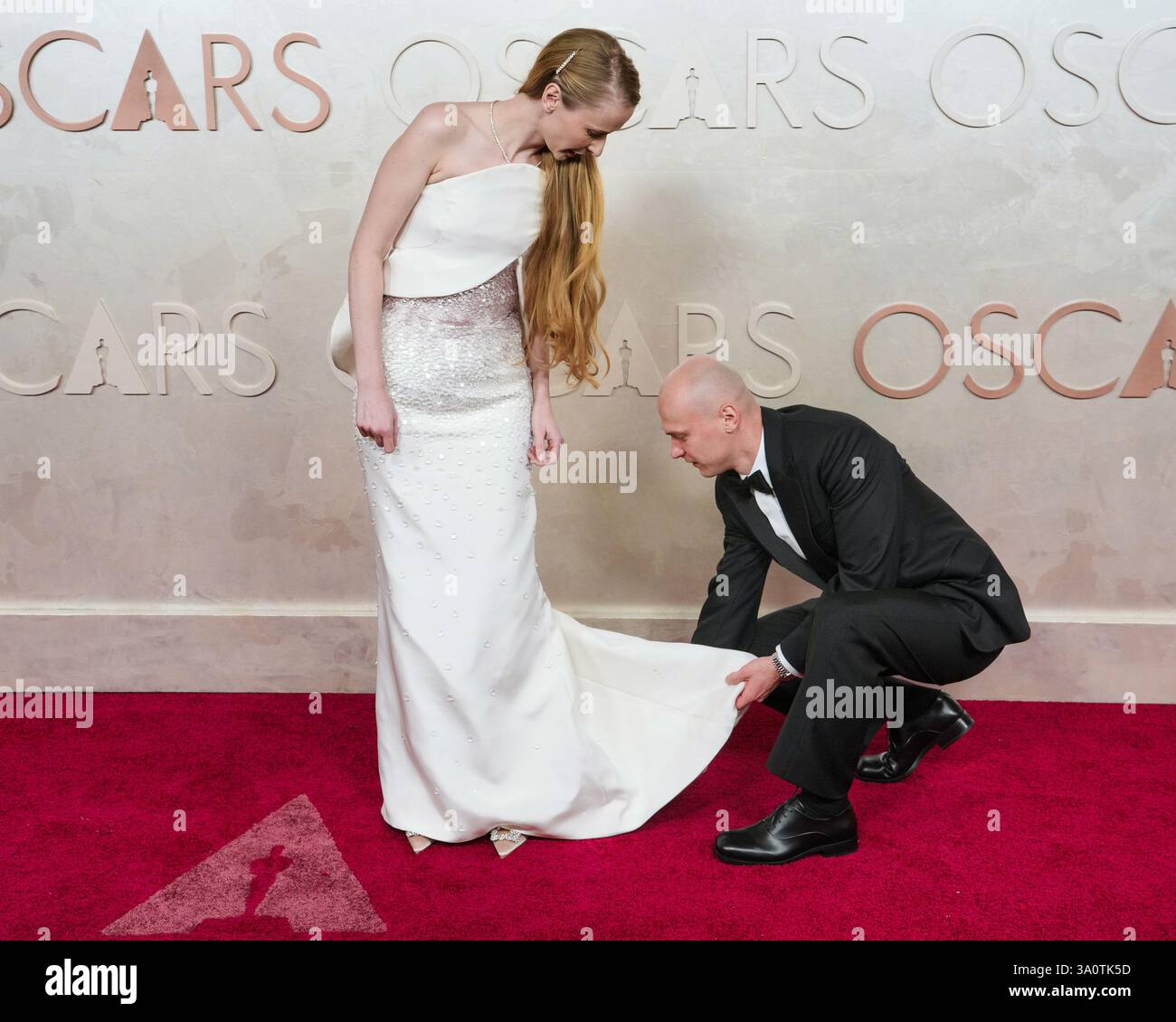 Los Angeles, USA. 02nd Mar, 2025. Yura Borisov, Anna Shevchuk walking ...