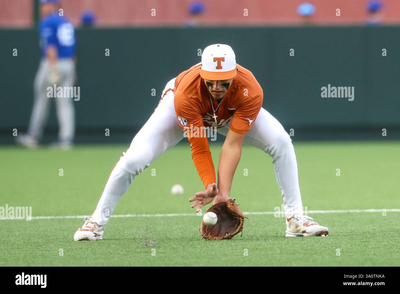 AUSTIN, TX - MARCH 04: Texas infielder Adrian Rodriguez (24) fields a ...