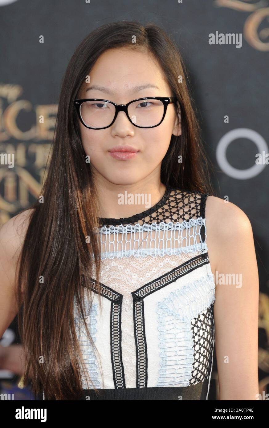 Madison Hu arriving at the premiere of Disney's 'Alice Through The ...