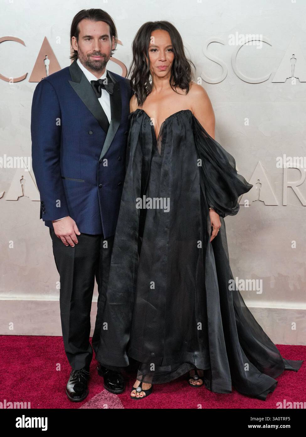 Alex Heineman and Elishia Holmes walking on the red carpet at the The ...