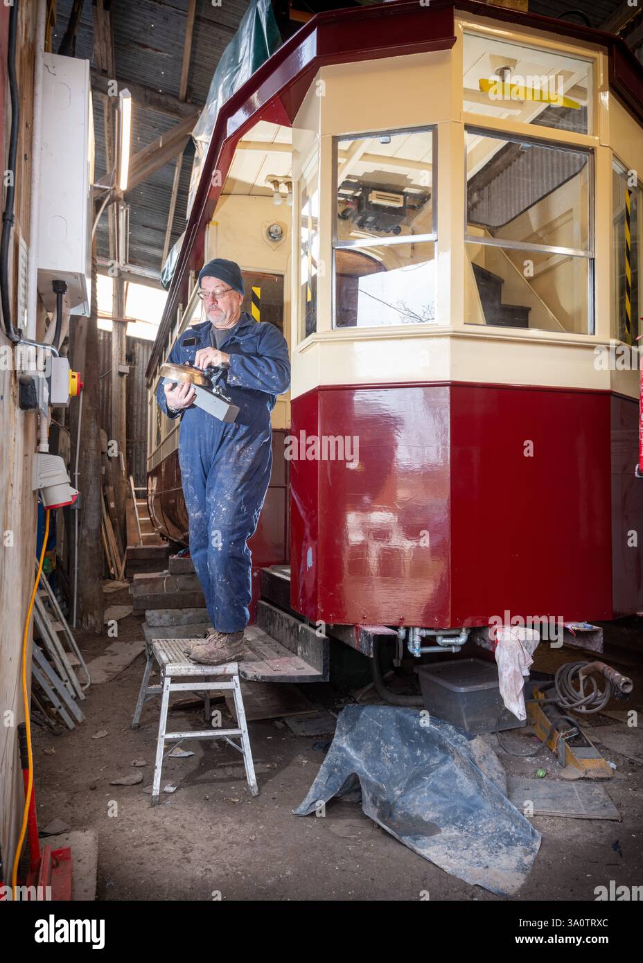 Guy Hall polishing the bell of Tram 53 built in 1936 by Brighton ...