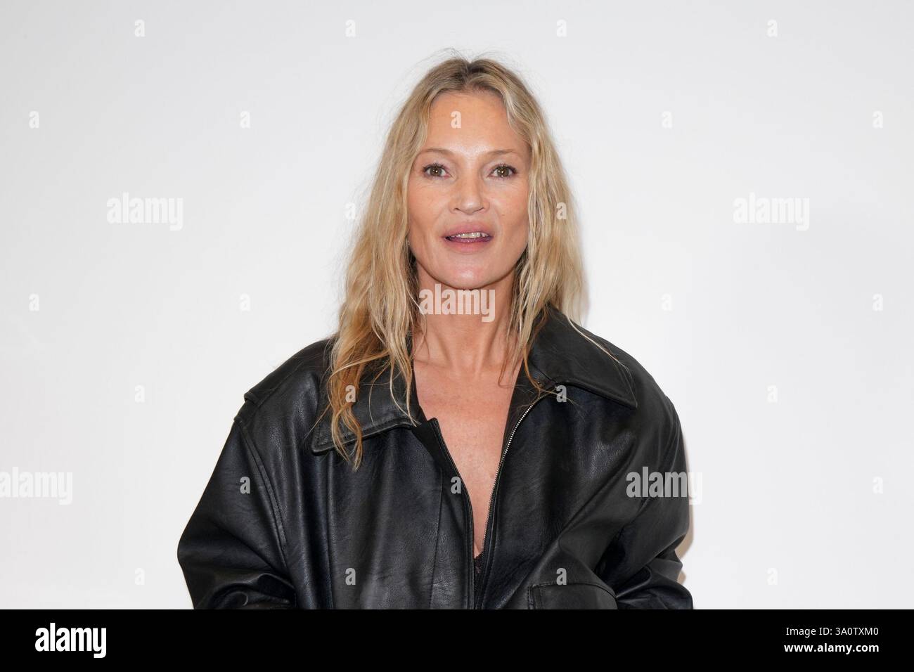 Kate Moss poses for photographers at the photo call for the Stella ...