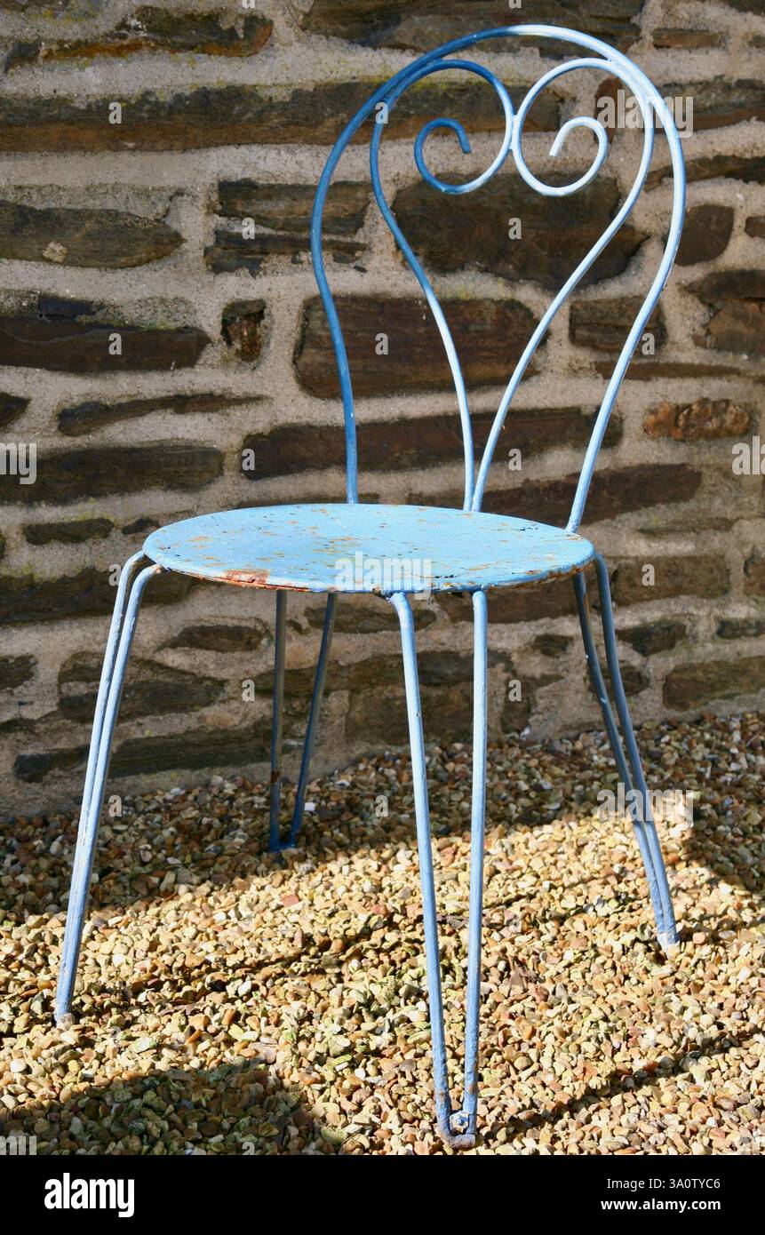 An old blue chair in the French countryside Stock Photo - Alamy