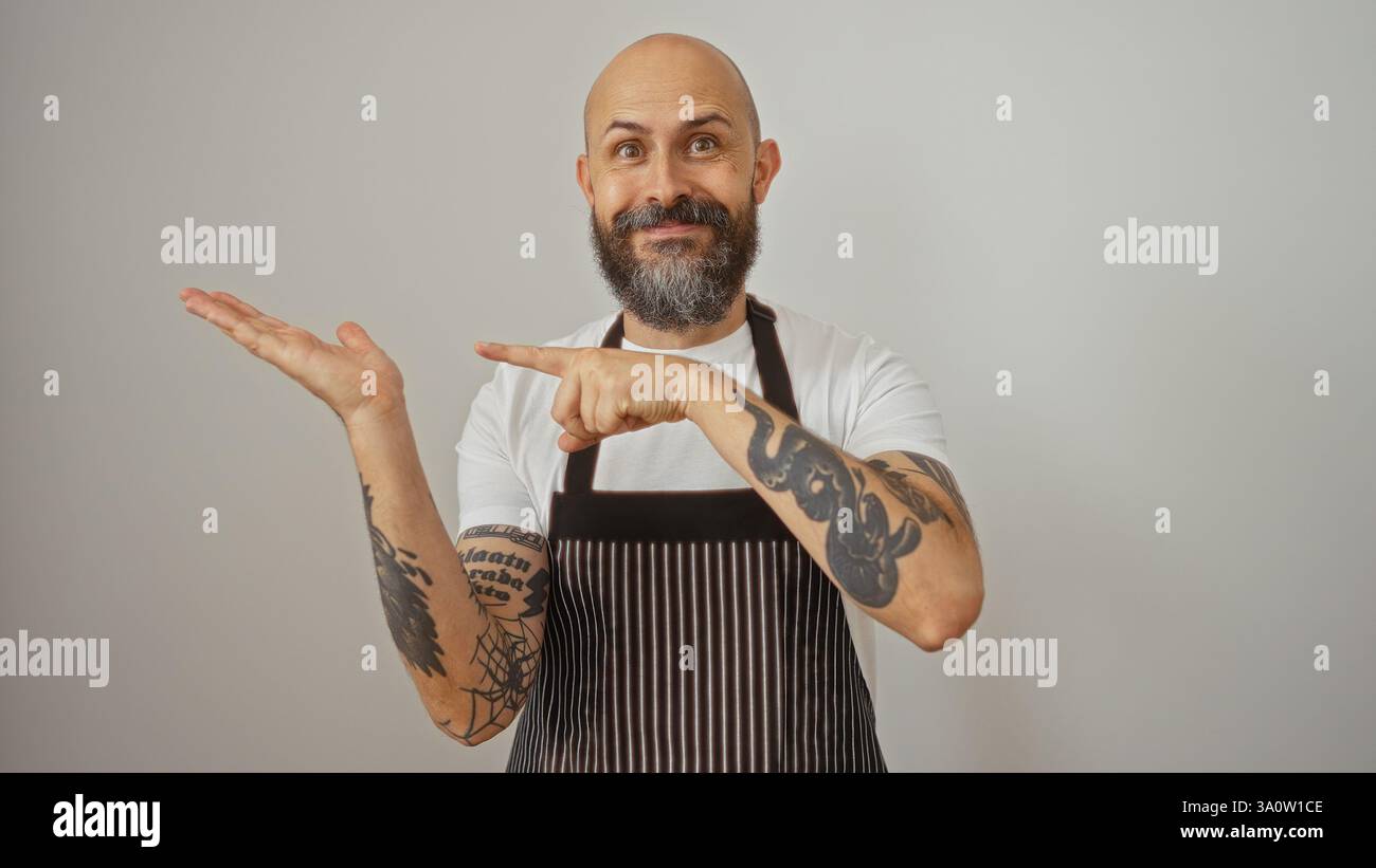 Hispanic man with a beard pointing to his palm on an isolated white ...