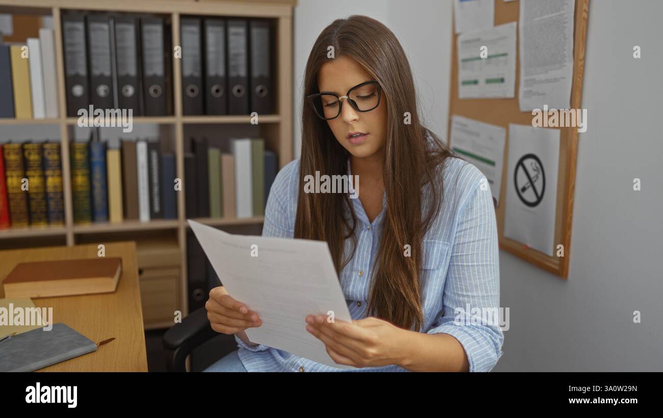 Woman reading, document, office, workplace, young, attractive, brunette ...