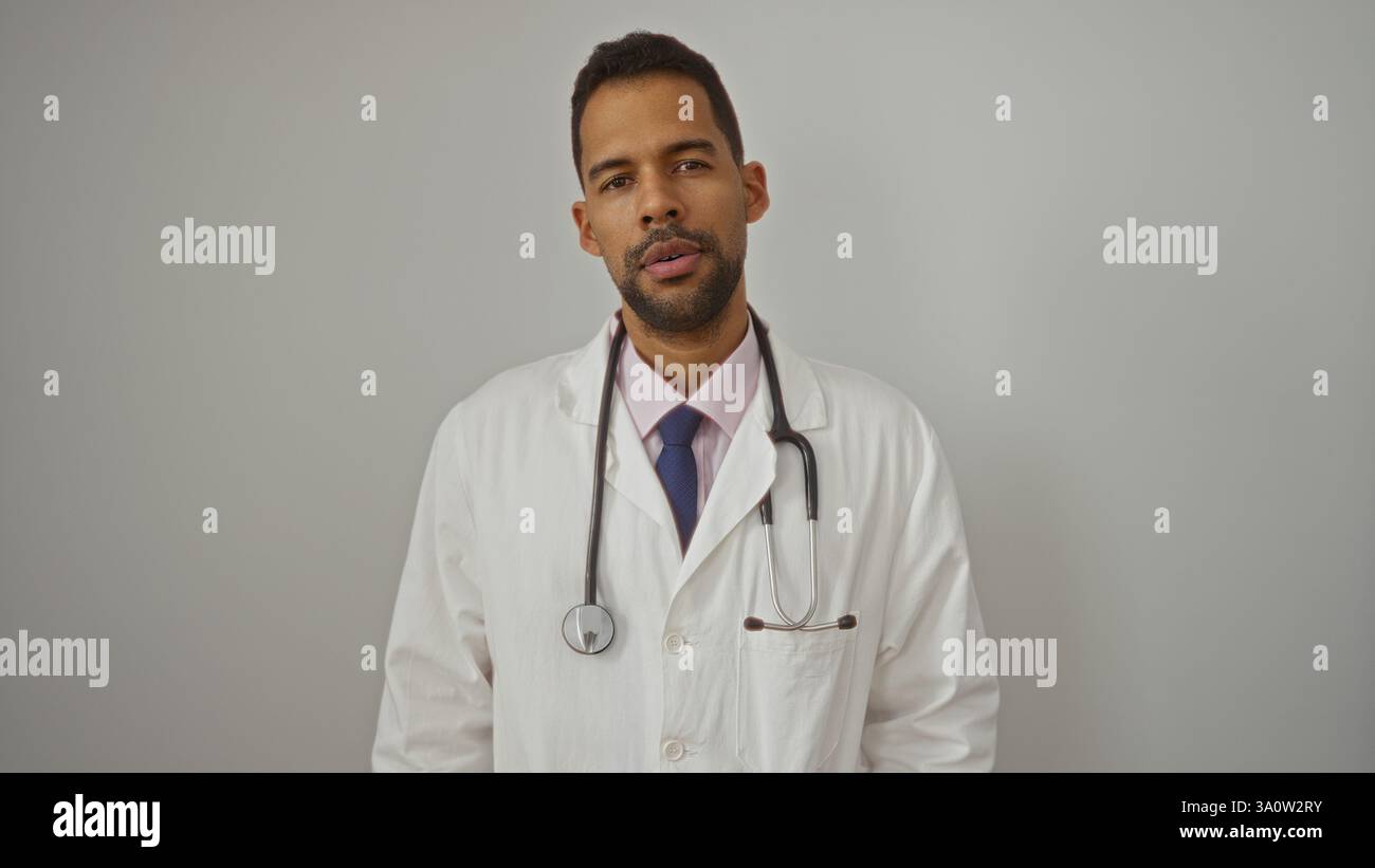 Handsome hispanic male doctor stands confidently with stethoscope ...