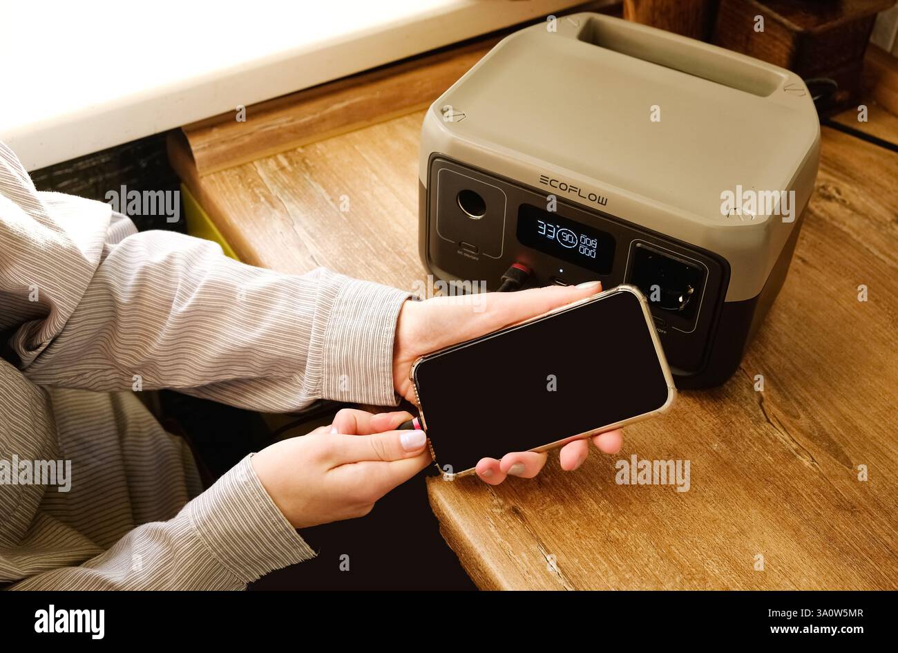 Lviv, Ukraine, March 2024, Top side view of a woman's hands connecting ...